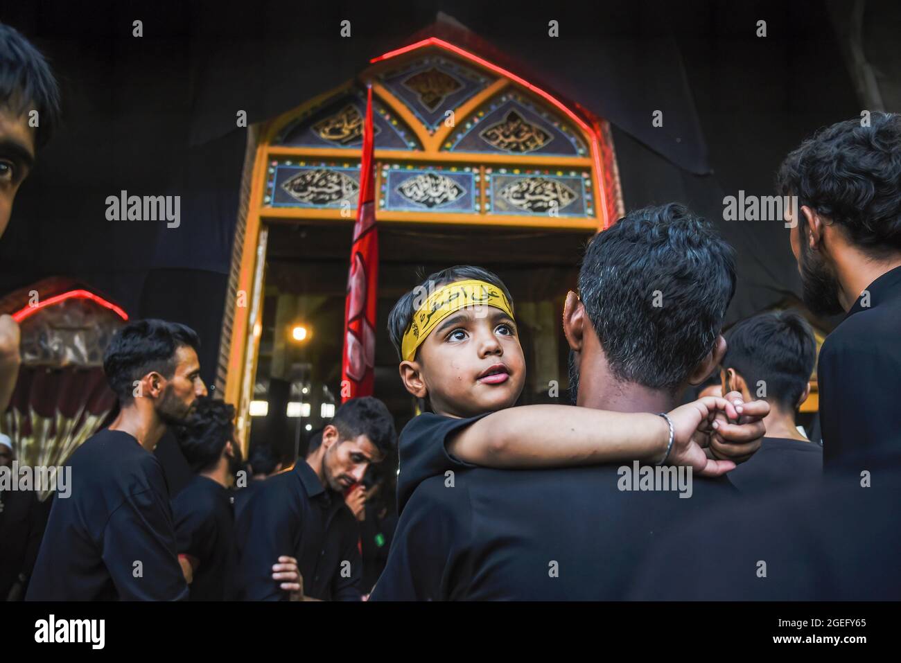A Kashmiri Shia boy looks on during the Ashura procession in Srinagar ...