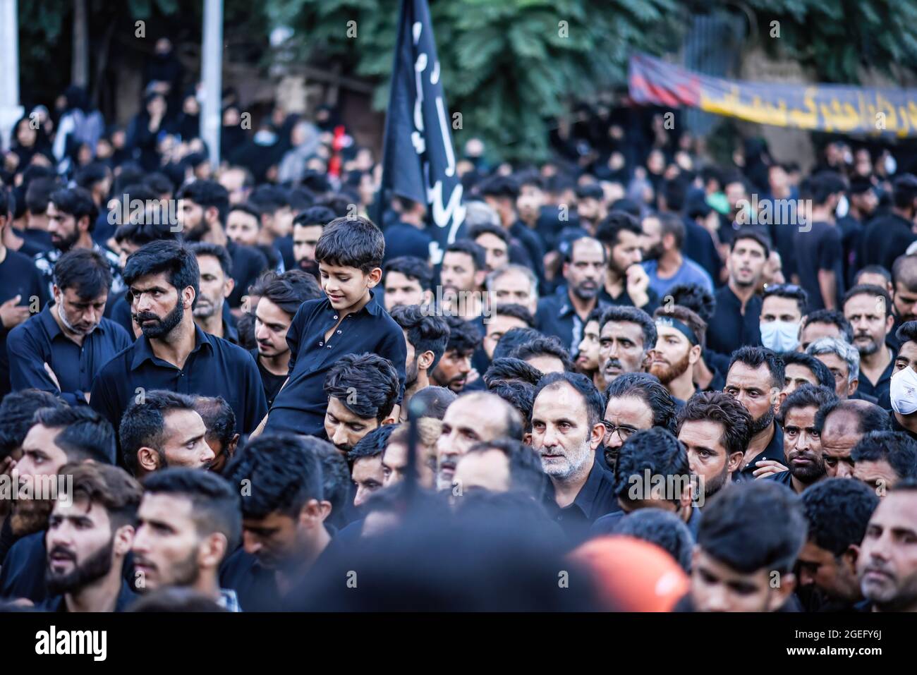 Kashmiri Shia Muslims take part during the Ashura procession in ...