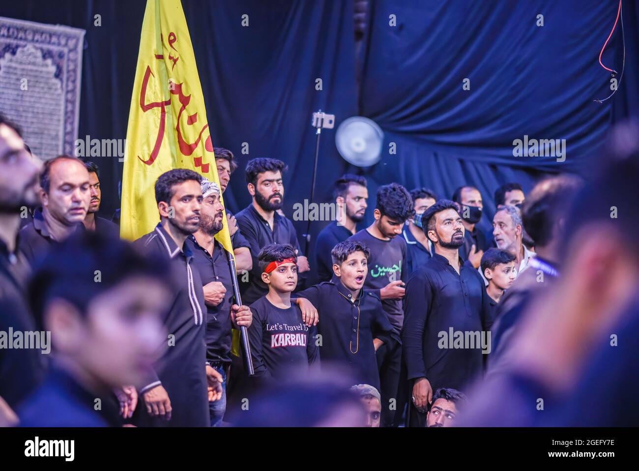 Kashmiri Shia Muslims take part during the Ashura procession in ...