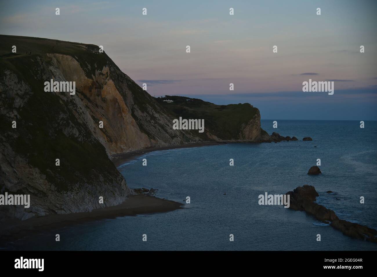 Durdle door at dusk Stock Photo - Alamy