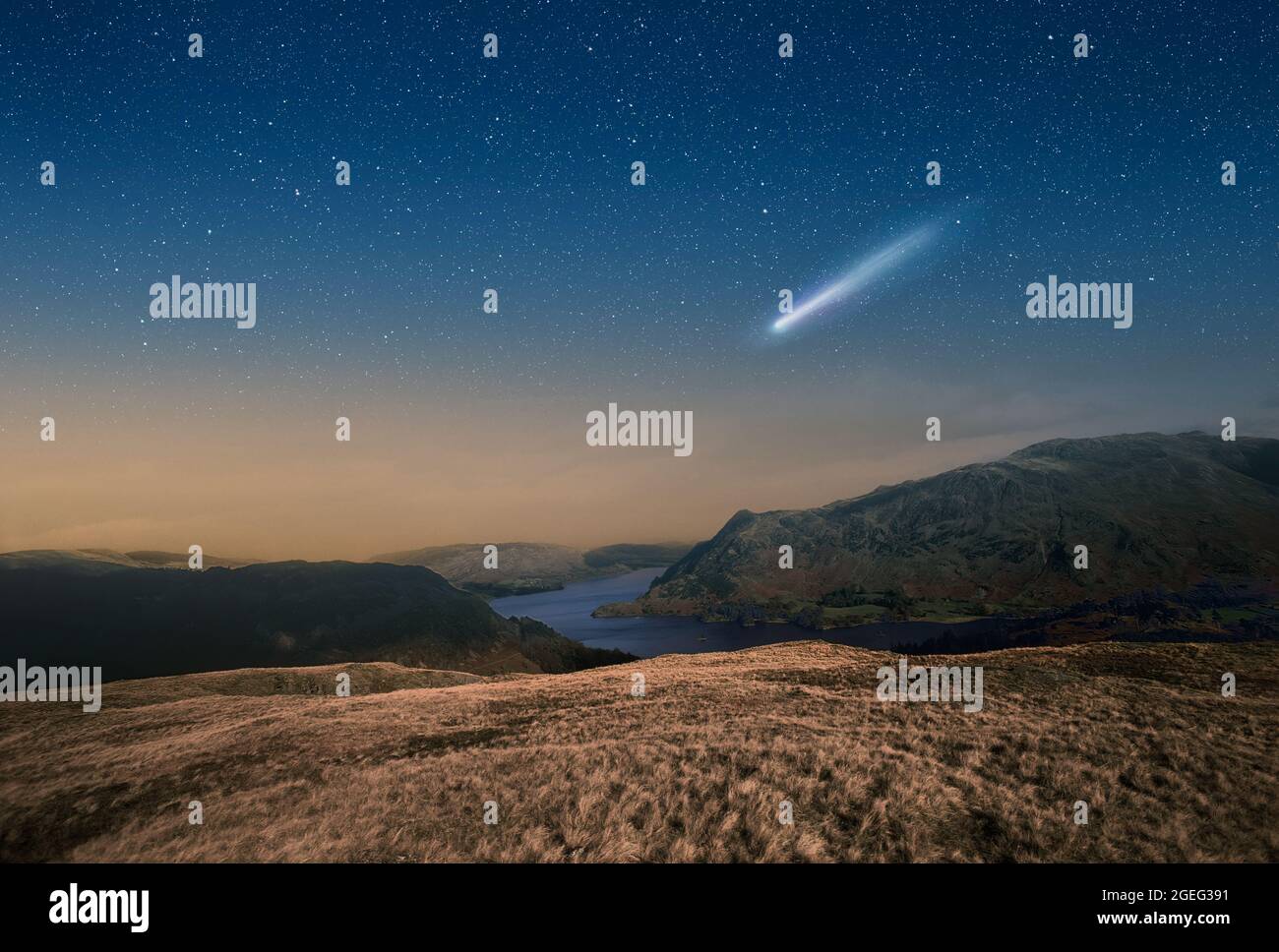 Stars and comet over Ullswater Lake District national park England UK ...