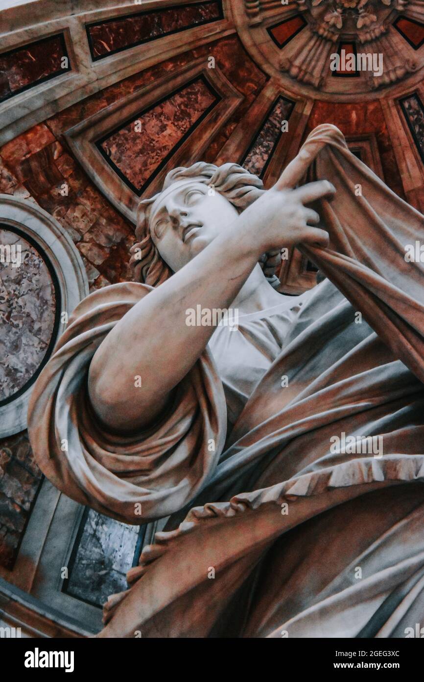 Vertical shot of statue details in Basilica di San Pietro, Vatican City ...