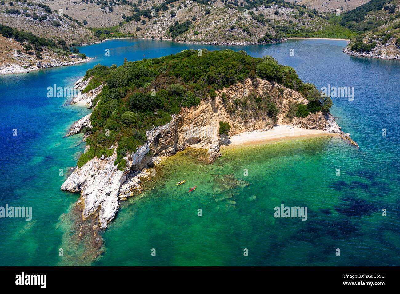 Aerial view of Tongo island and kayakers in southern albania, Albania ...