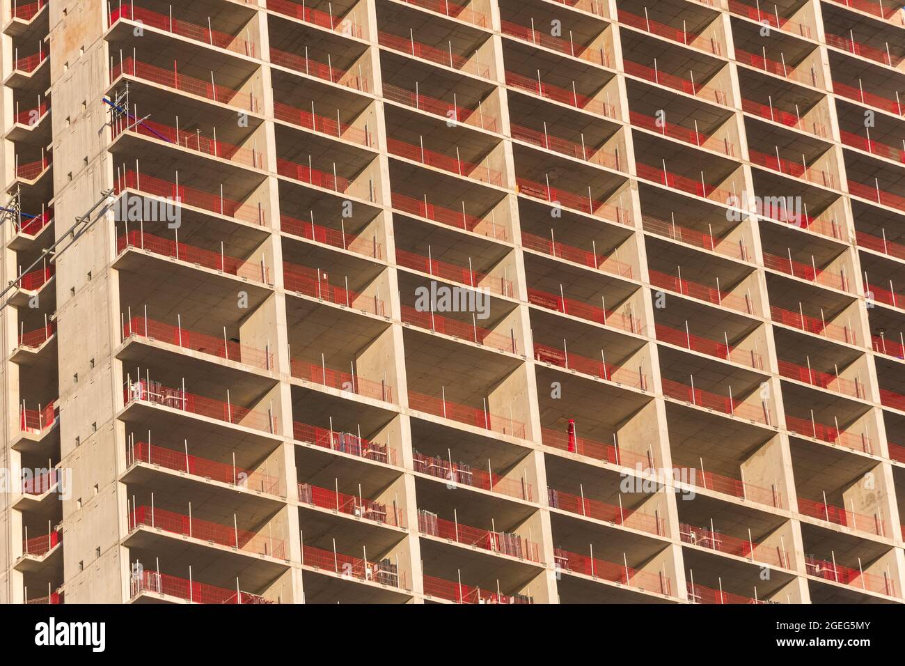 Repeating pattern of a residential skyscraper under construction in ...