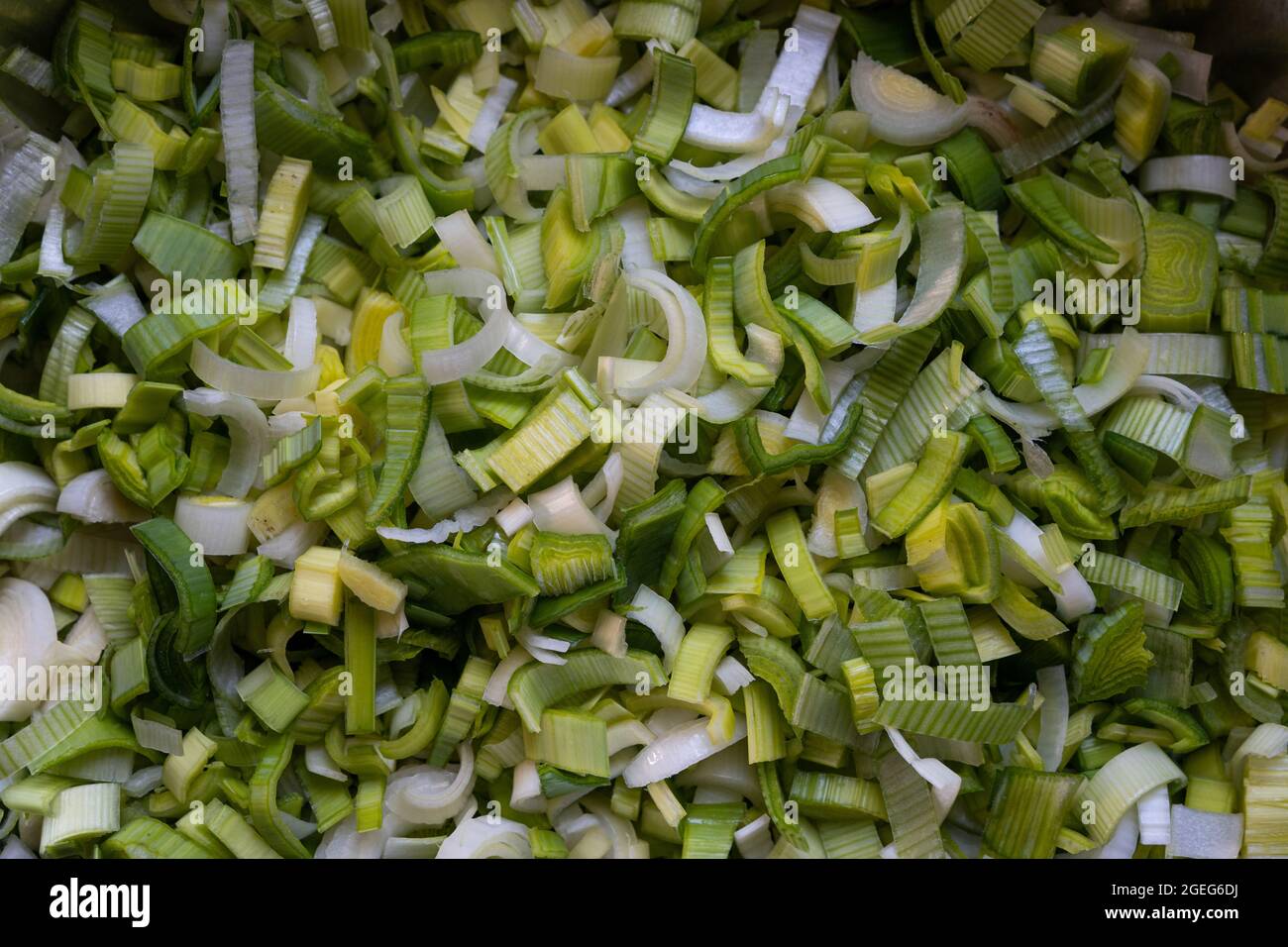 Top view of a heap of sliced leek in a pan - cut green leek texture ...