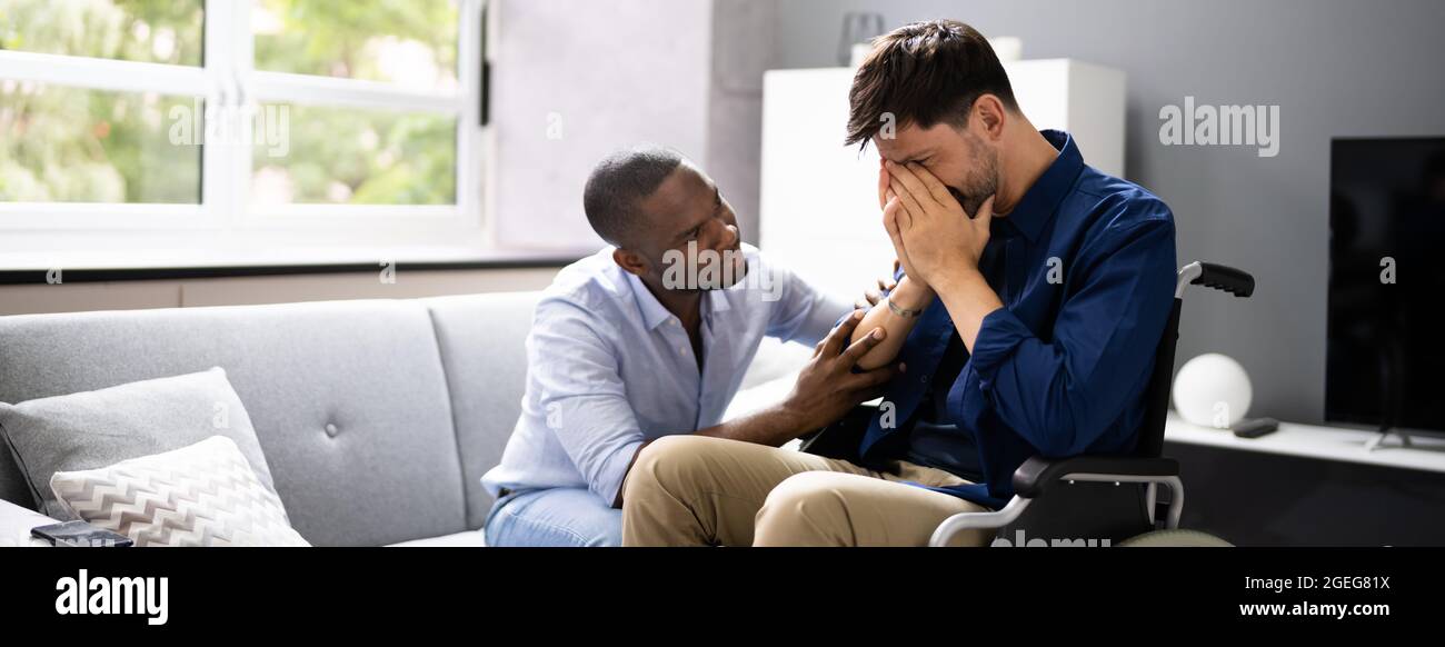 Unhappy Disabled Sad Man In Wheelchair Support Stock Photo - Alamy