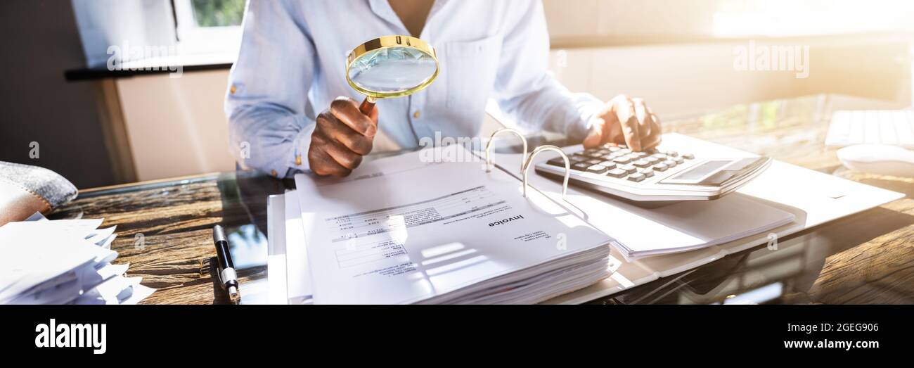 Professional Auditor Fraud Investigation Using Magnifying Glass Stock ...