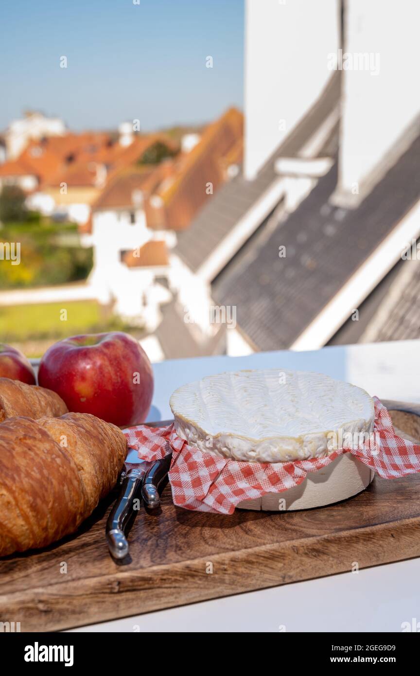 French breakfast with fresh baked croissants and cheeses from Normandy ...
