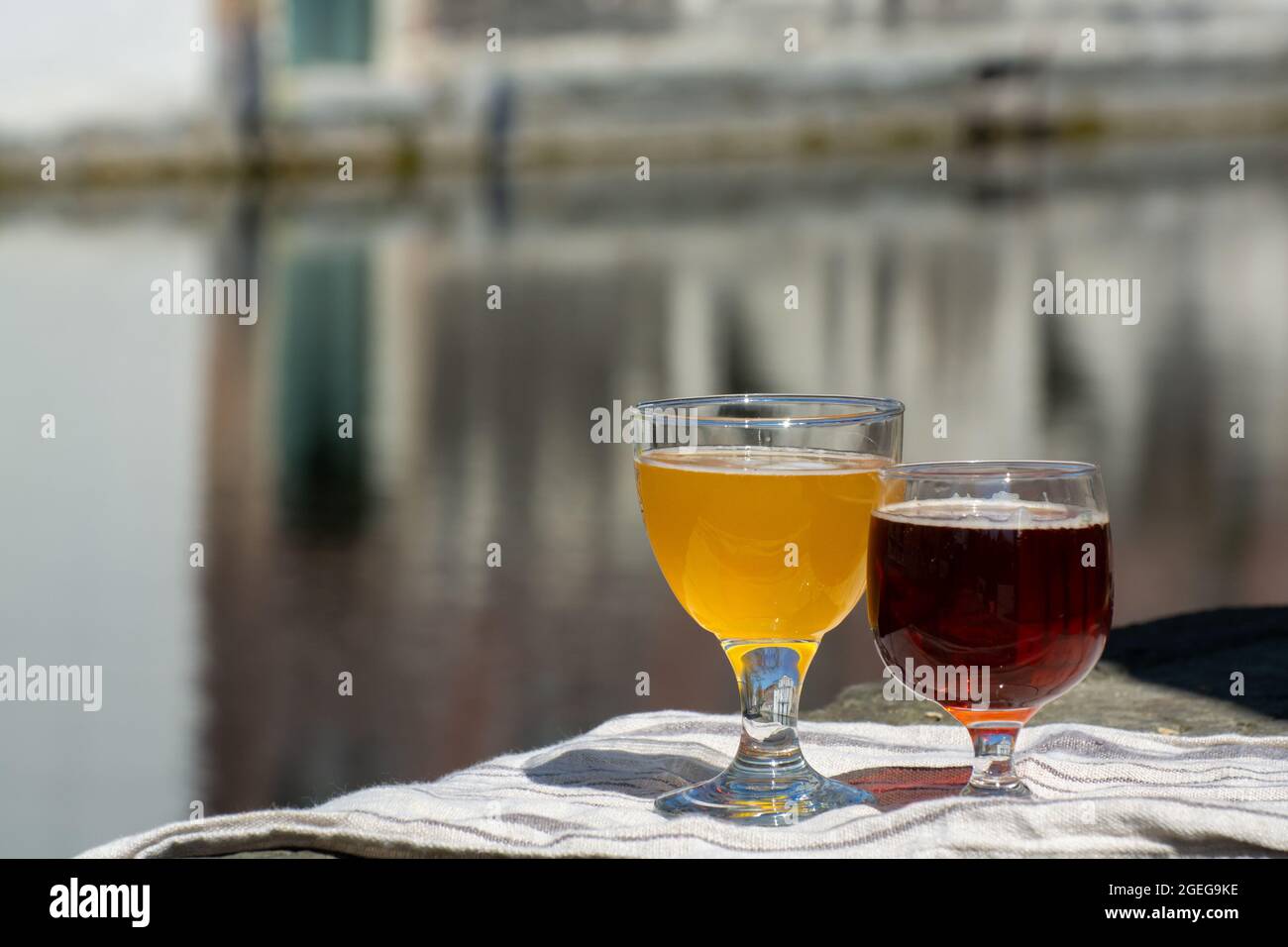 Tasting of Belgian beer on open cafe or bistro terrace with view on ...