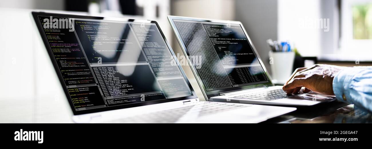 African American Coder Using Computer At Desk. Web Developer Stock ...