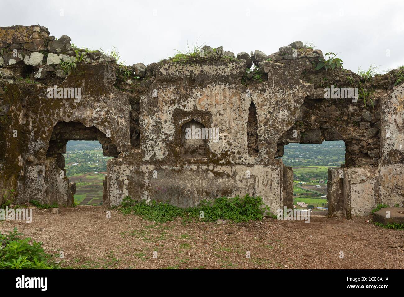 Walls of Hatgad fort in ruins, Nashik, Maharashtra, India Stock Photo ...