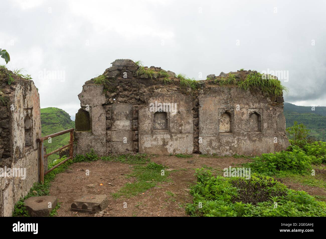 Walls of Hatgad fort in ruins, Nashik, Maharashtra, India Stock Photo ...