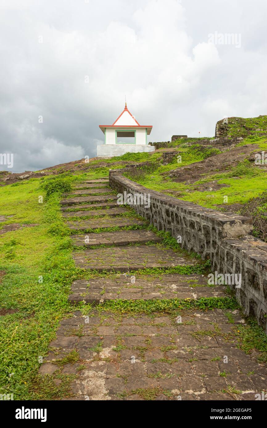 Stairs and the view of Lord Shiva temple on top of the fort, Hatgad ...