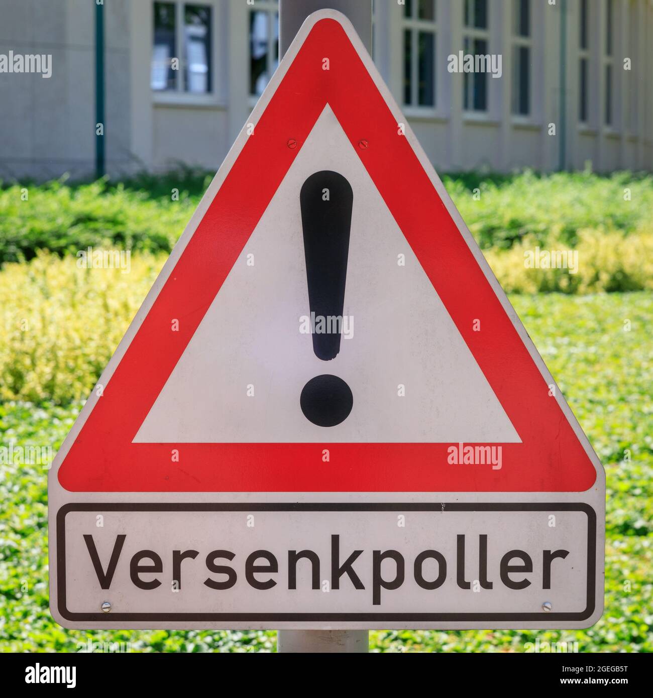Road sign 'Versenkpoller' (retractable bollards), warning signage with ...
