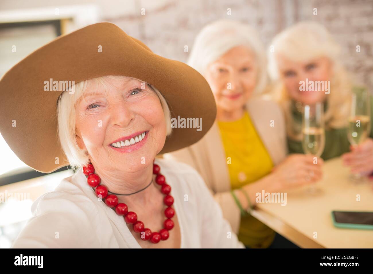 Women having great time and looking happy Stock Photo - Alamy
