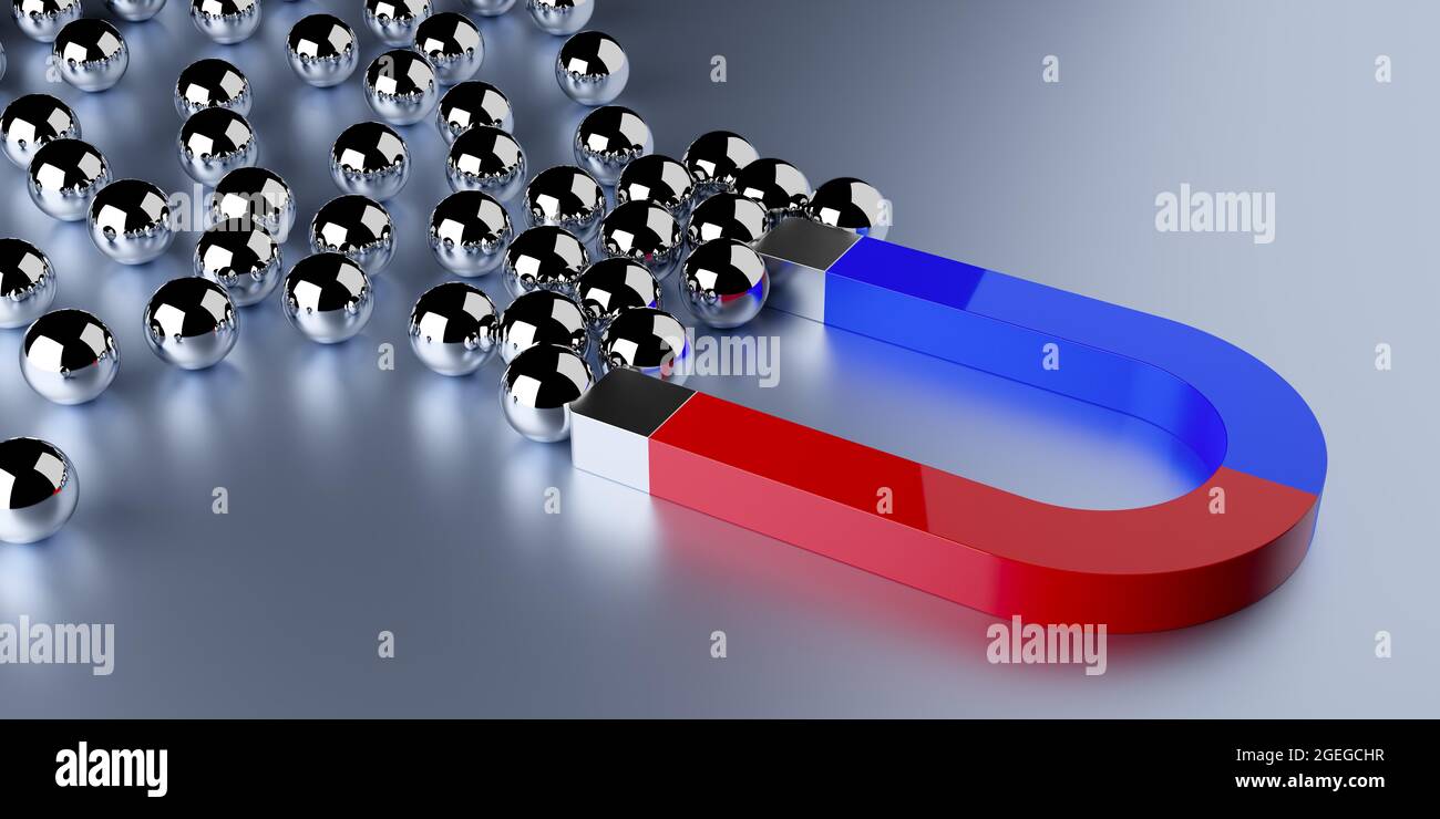 Magnet attracting silver spheres on grey background, business marketing ...