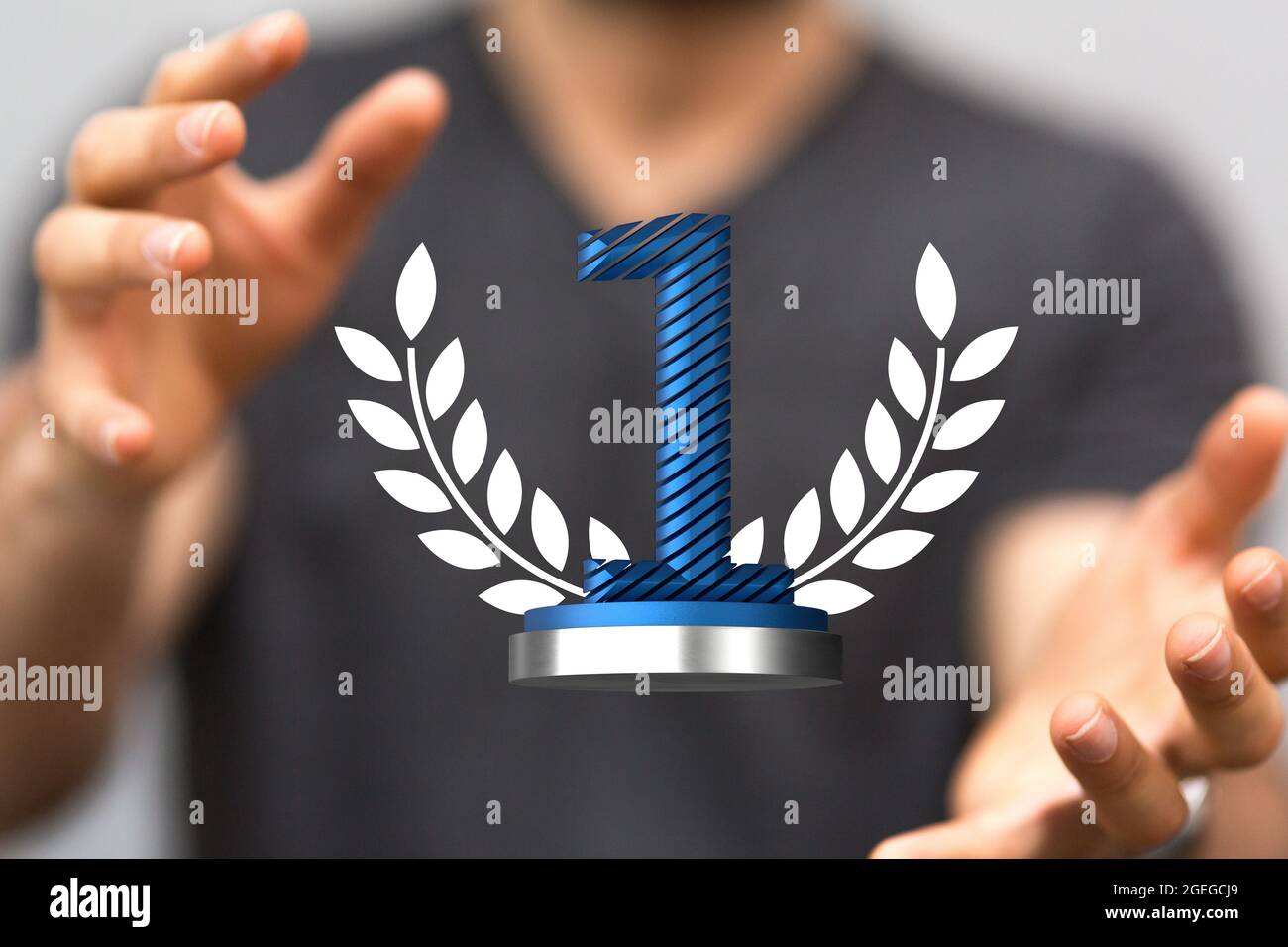 Gold winner first place in hand Stock Photo - Alamy