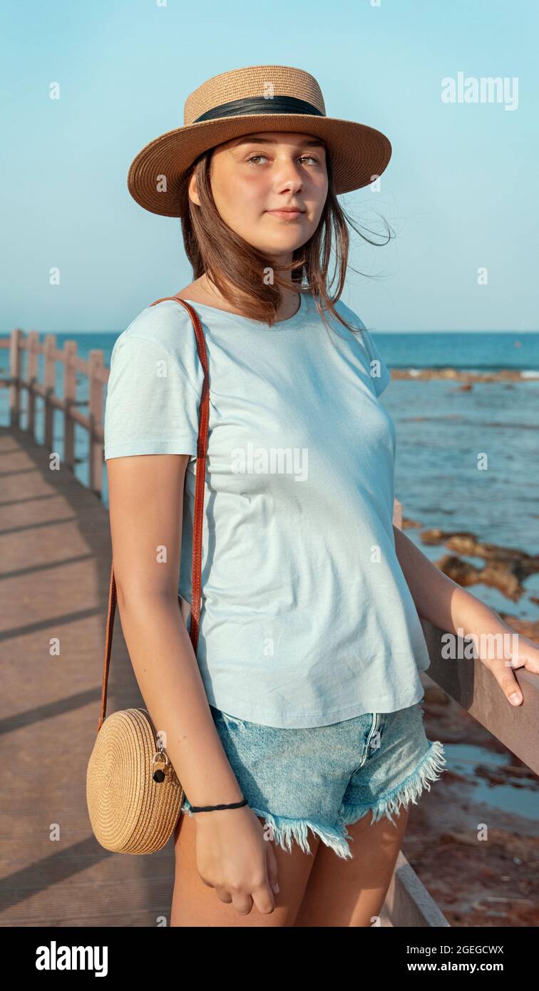 Wearing light blue hi-res stock photography and images - Alamy