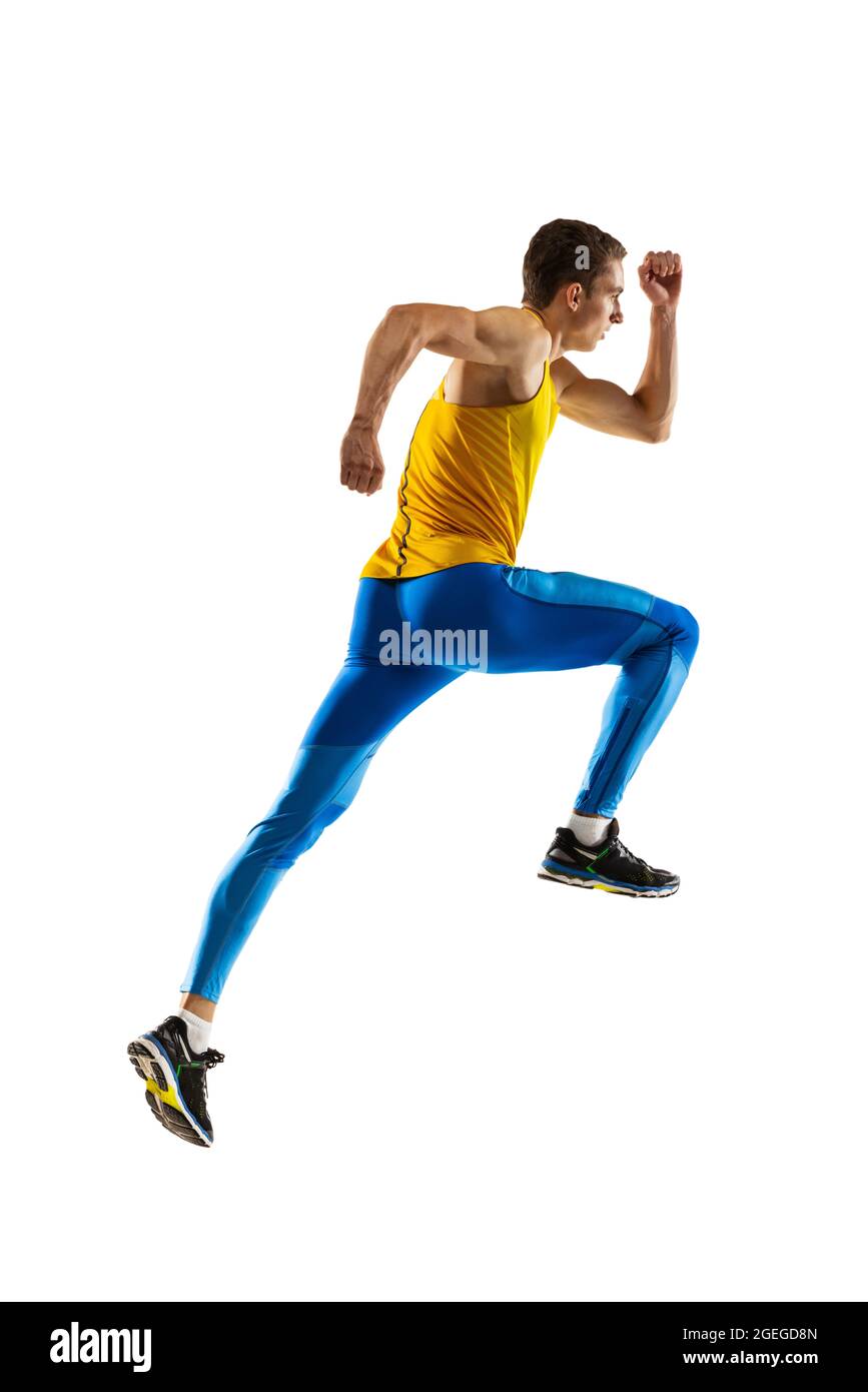 Back view of Caucasian professional male athlete, runner training ...