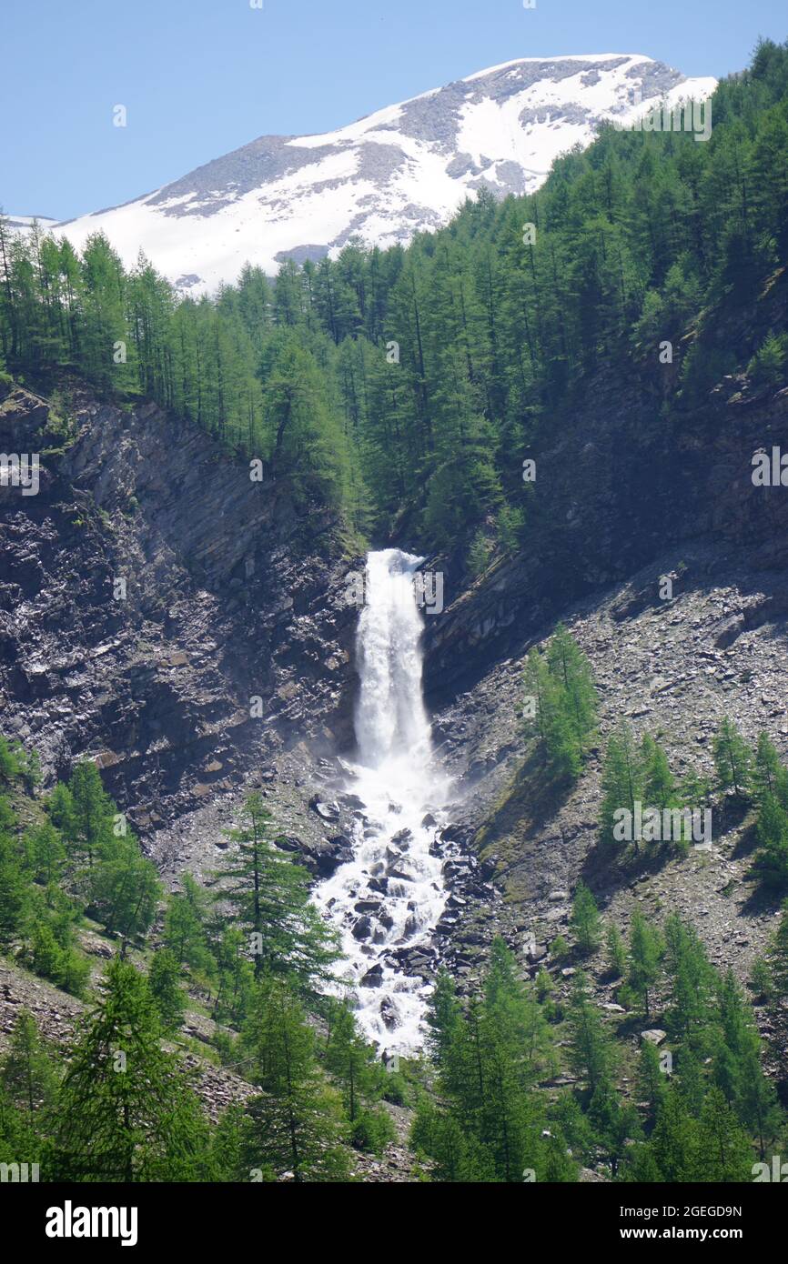 tall waterfall mountains alps france Stock Photo - Alamy