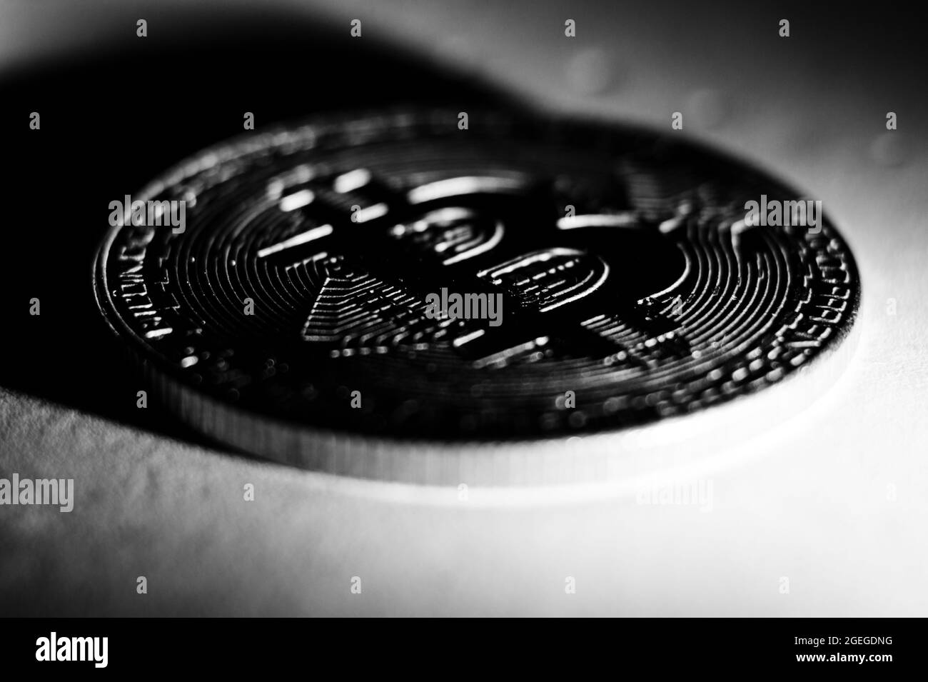 Grayscale of bitcoin sign on a coin with the black background Stock ...