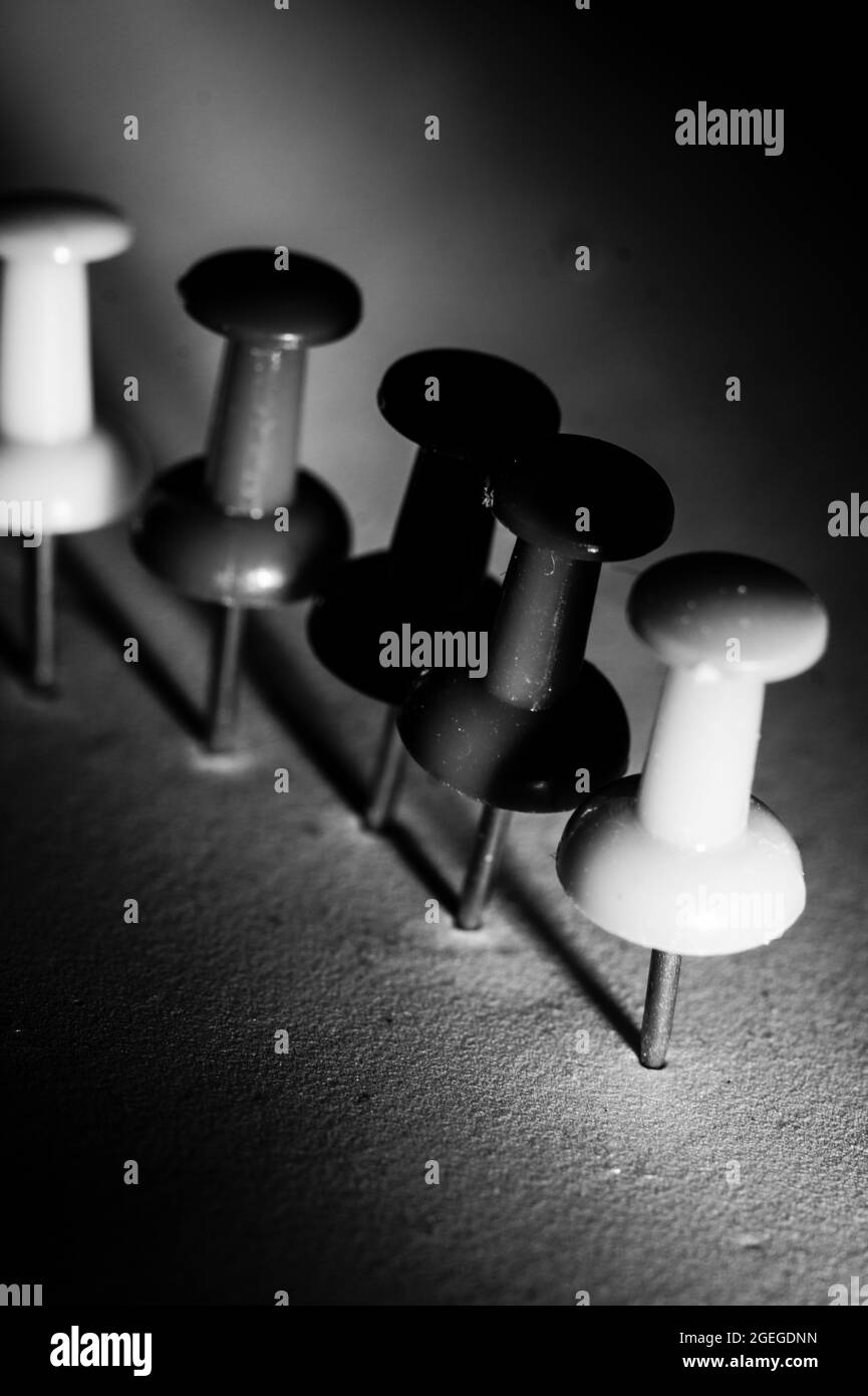 Grayscale of the pins with the black background Stock Photo - Alamy