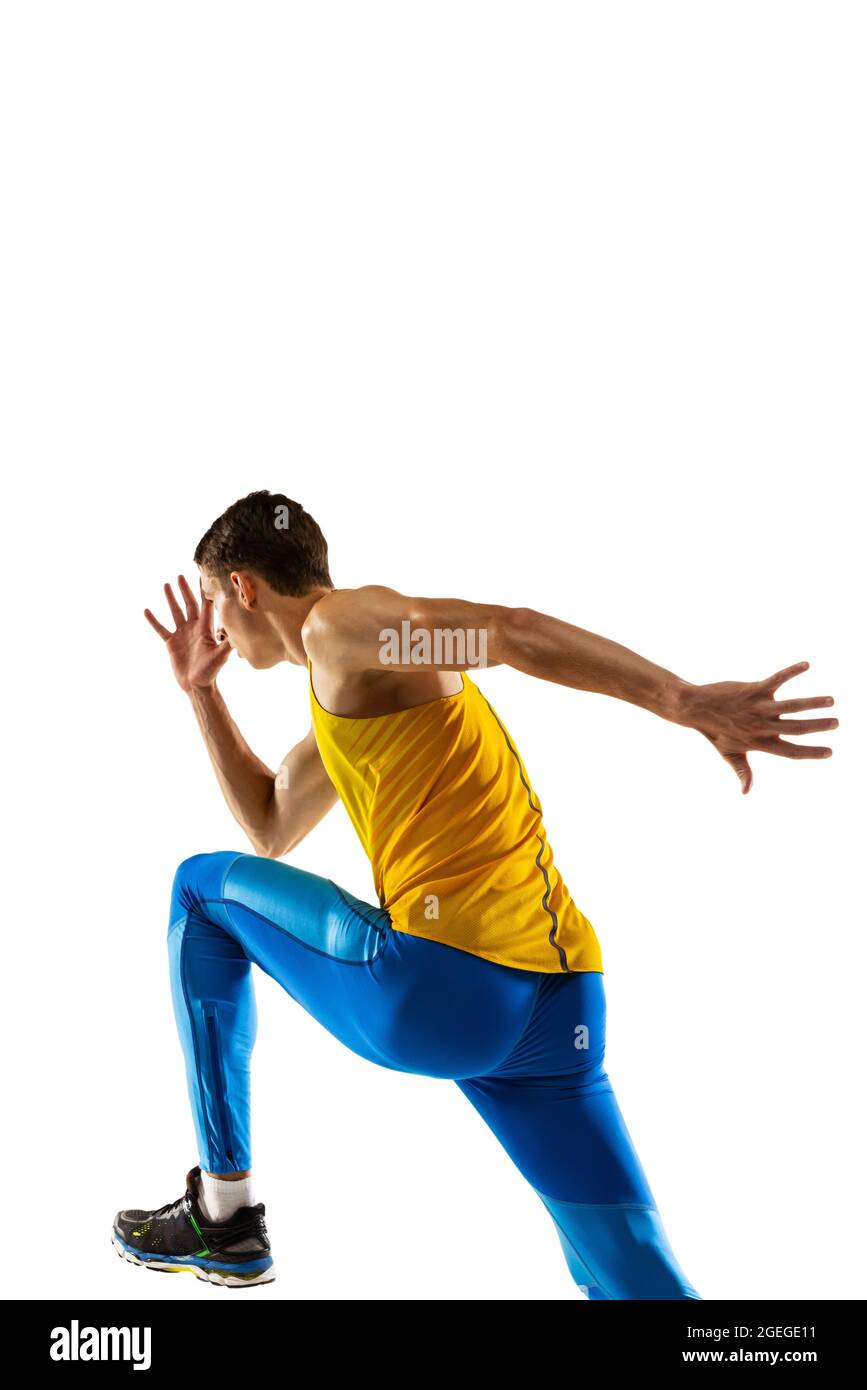 Back view of Caucasian professional male athlete, runner training ...