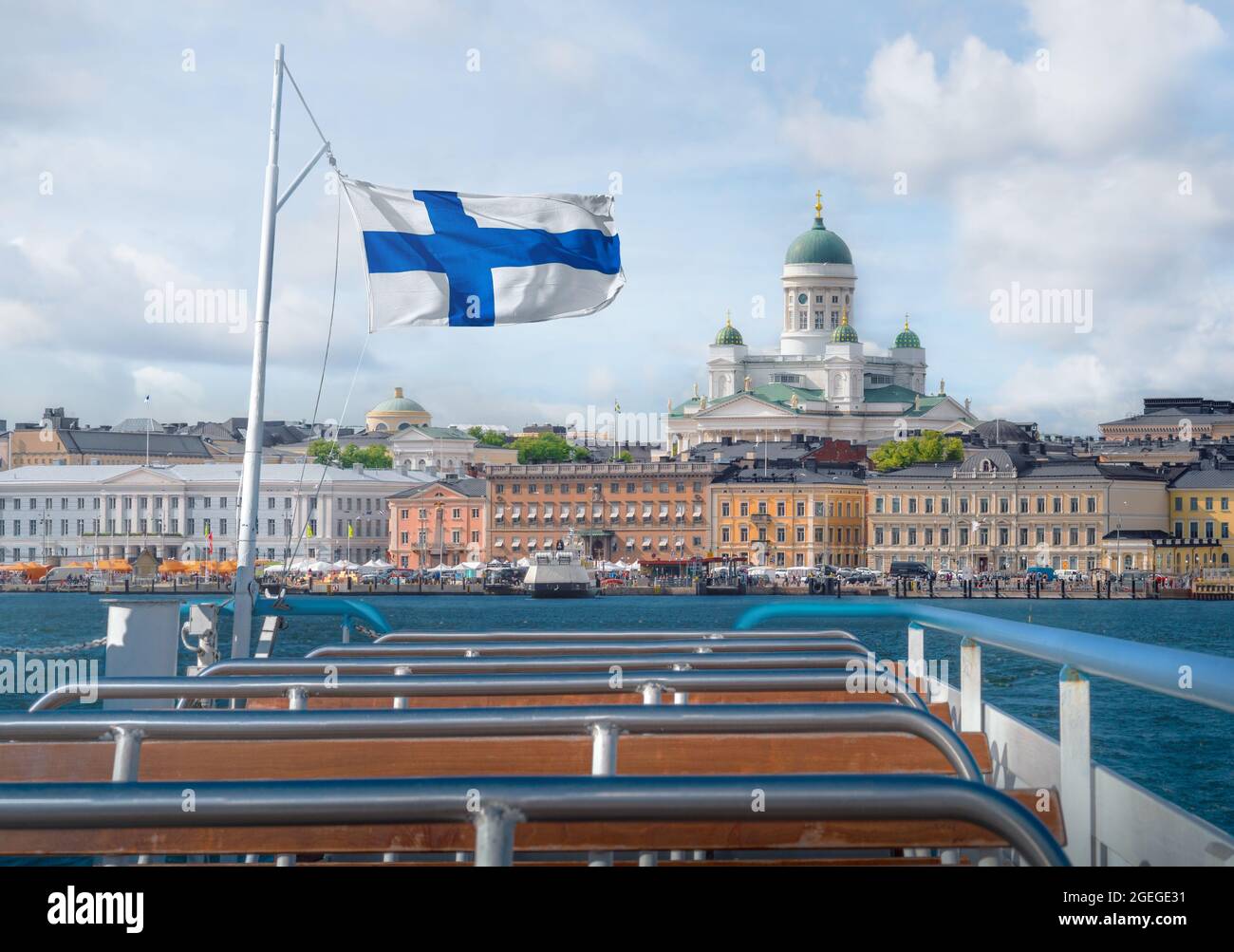 Helsinki skyline boat view with Finnish flag and Helsinki Cathedral ...