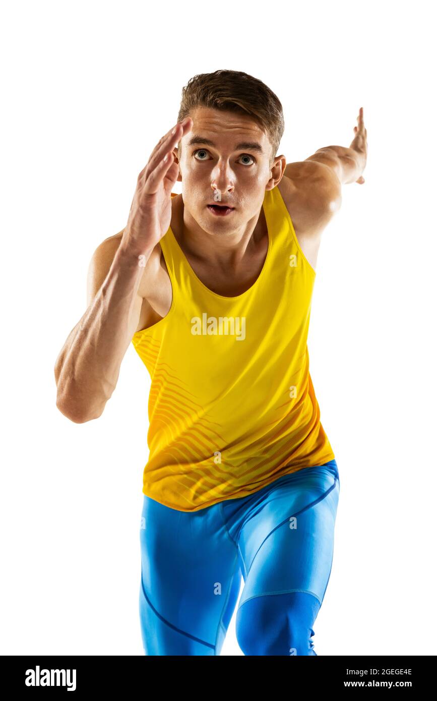 Close-up Caucasian professional male athlete, runner training isolated ...