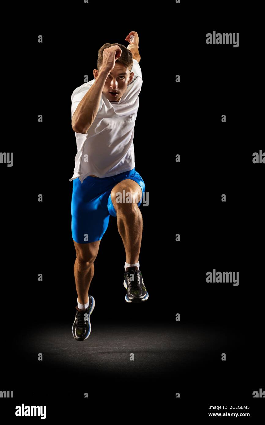 Static portrait muscular, sportive man, male athlete, runner training ...