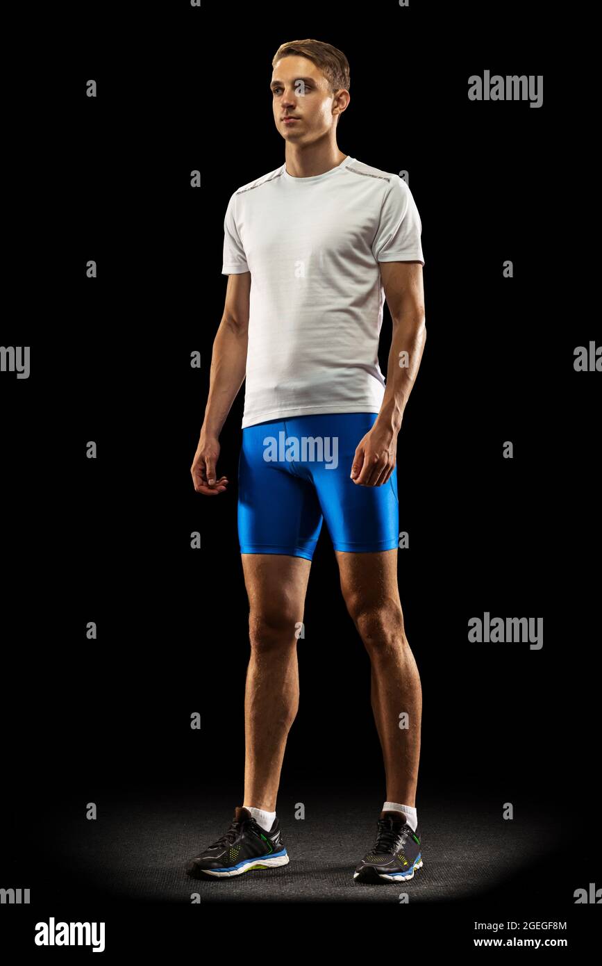 Portrait of Caucasian professional male athlete in sports uniform ...
