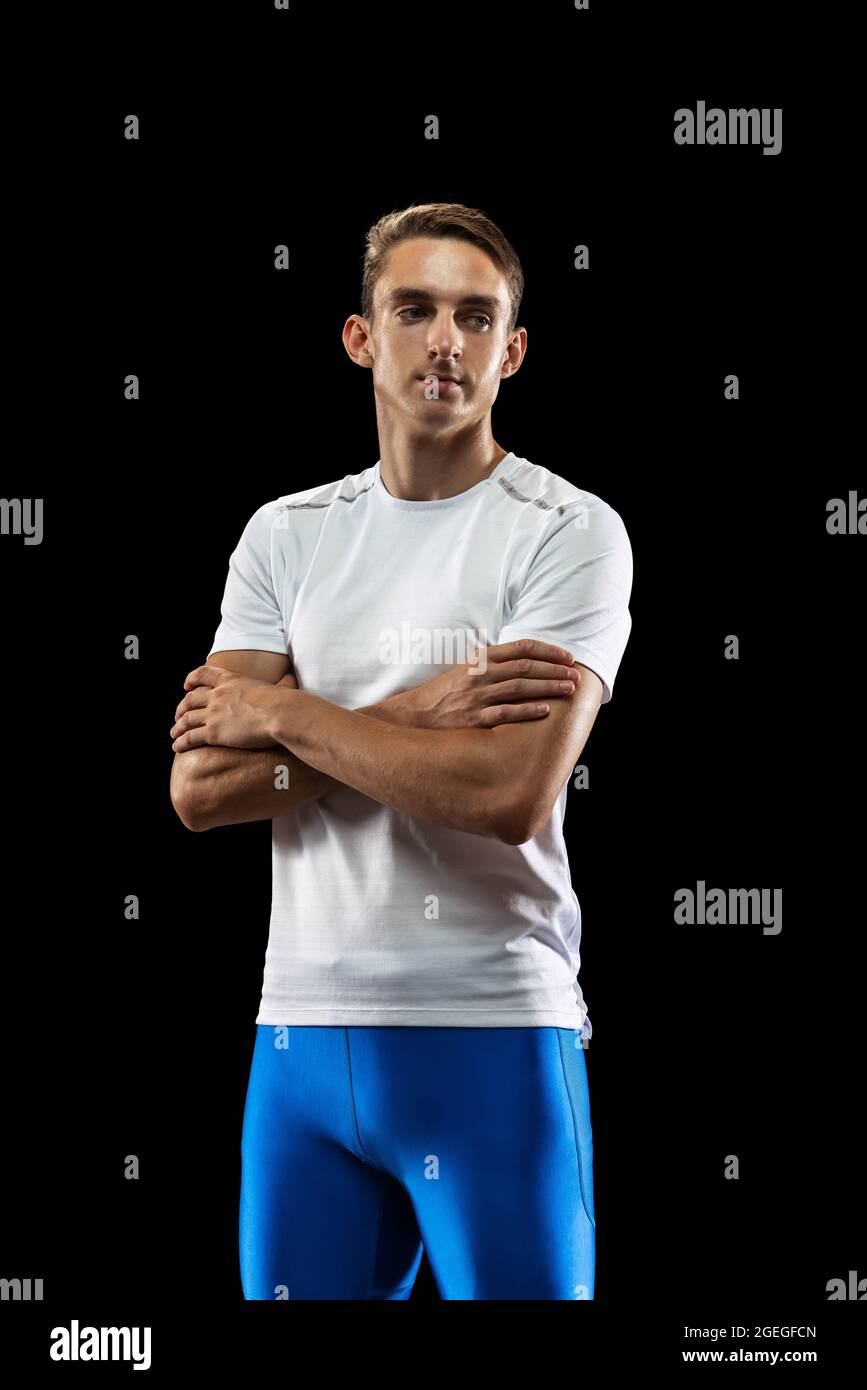 Portrait of Caucasian professional male athlete in sports uniform ...