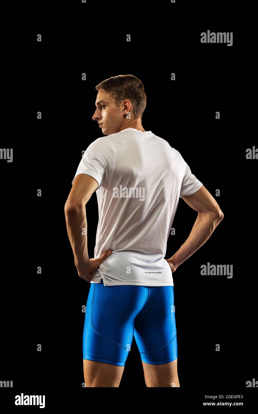 Portrait of Caucasian professional male athlete in sports uniform ...