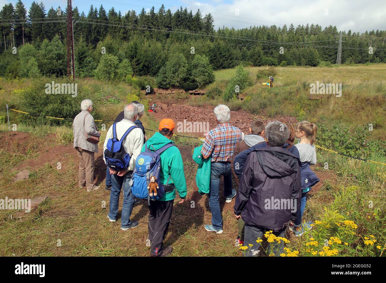 Georgenthal, Germany. 20th Aug, 2021. Spectators watch excavations at ...