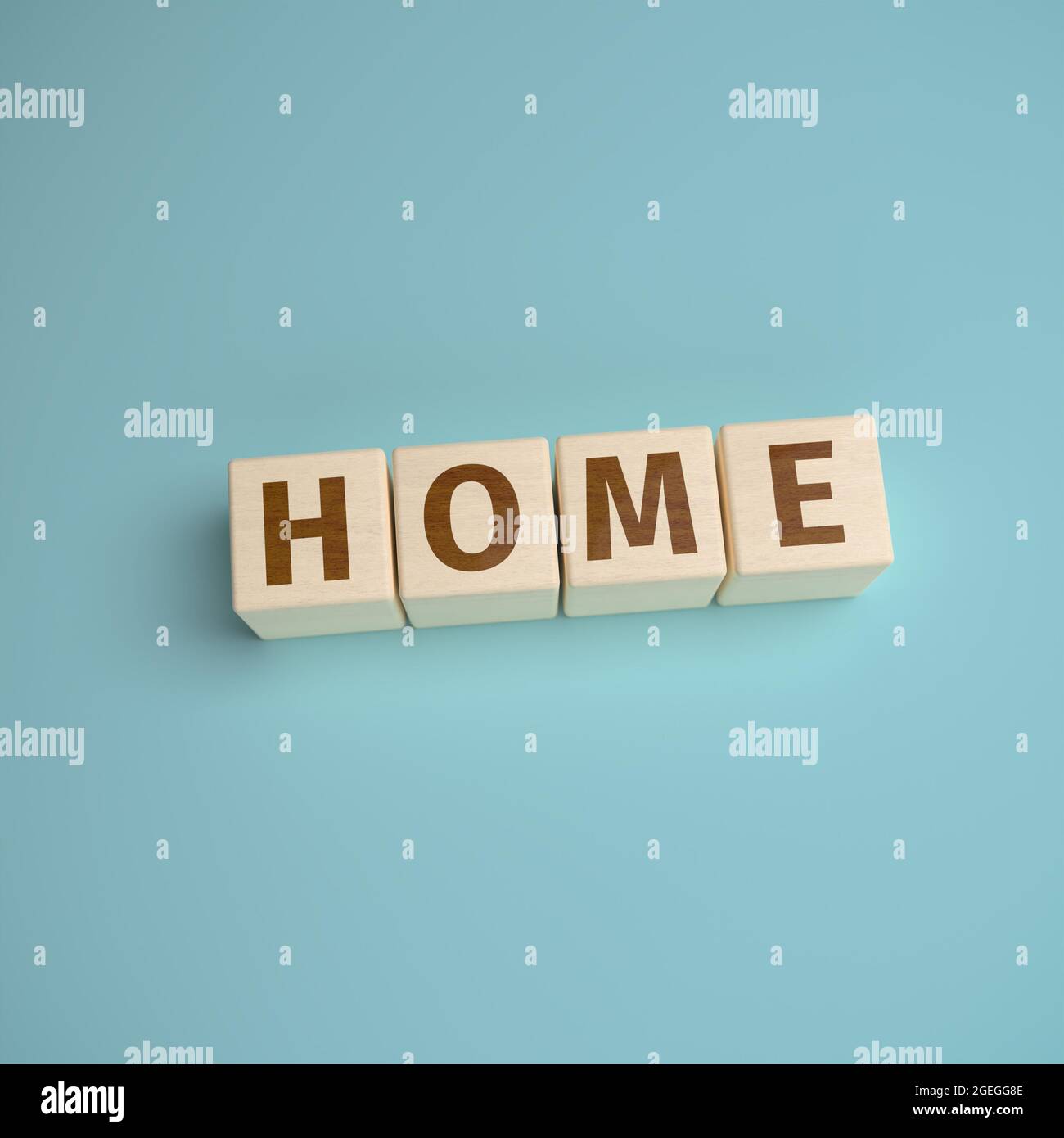 The word home built from letters on wooden cubes. High angle view with ...