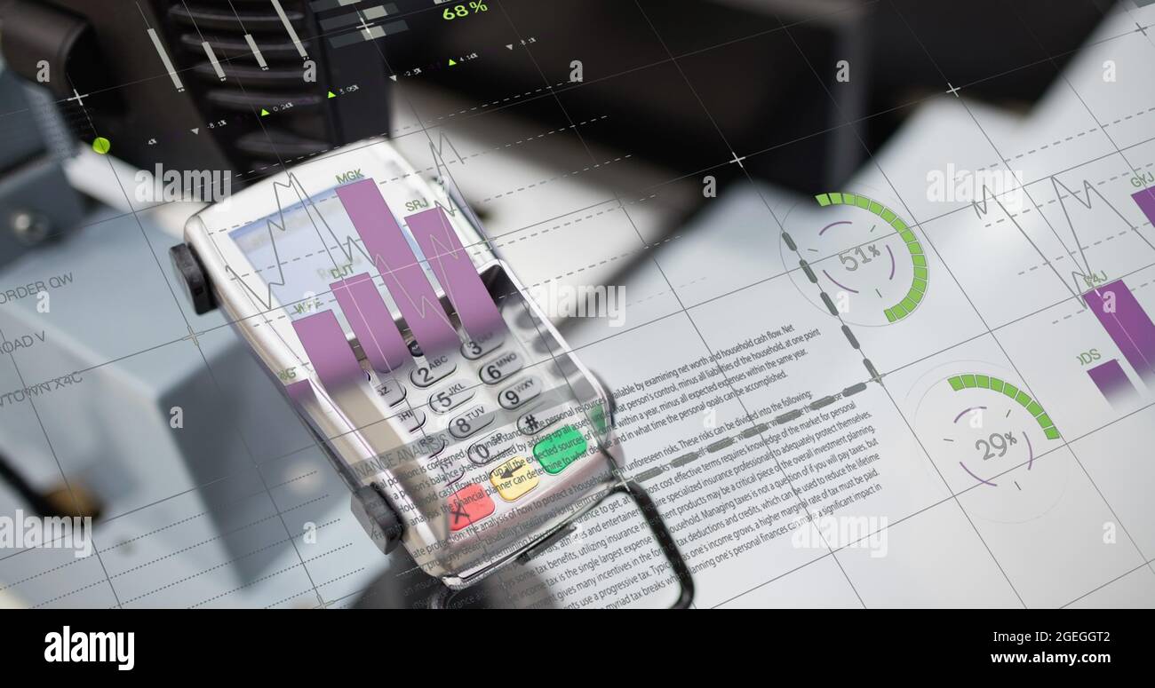 Image of financial data processing over payment terminal Stock Photo ...
