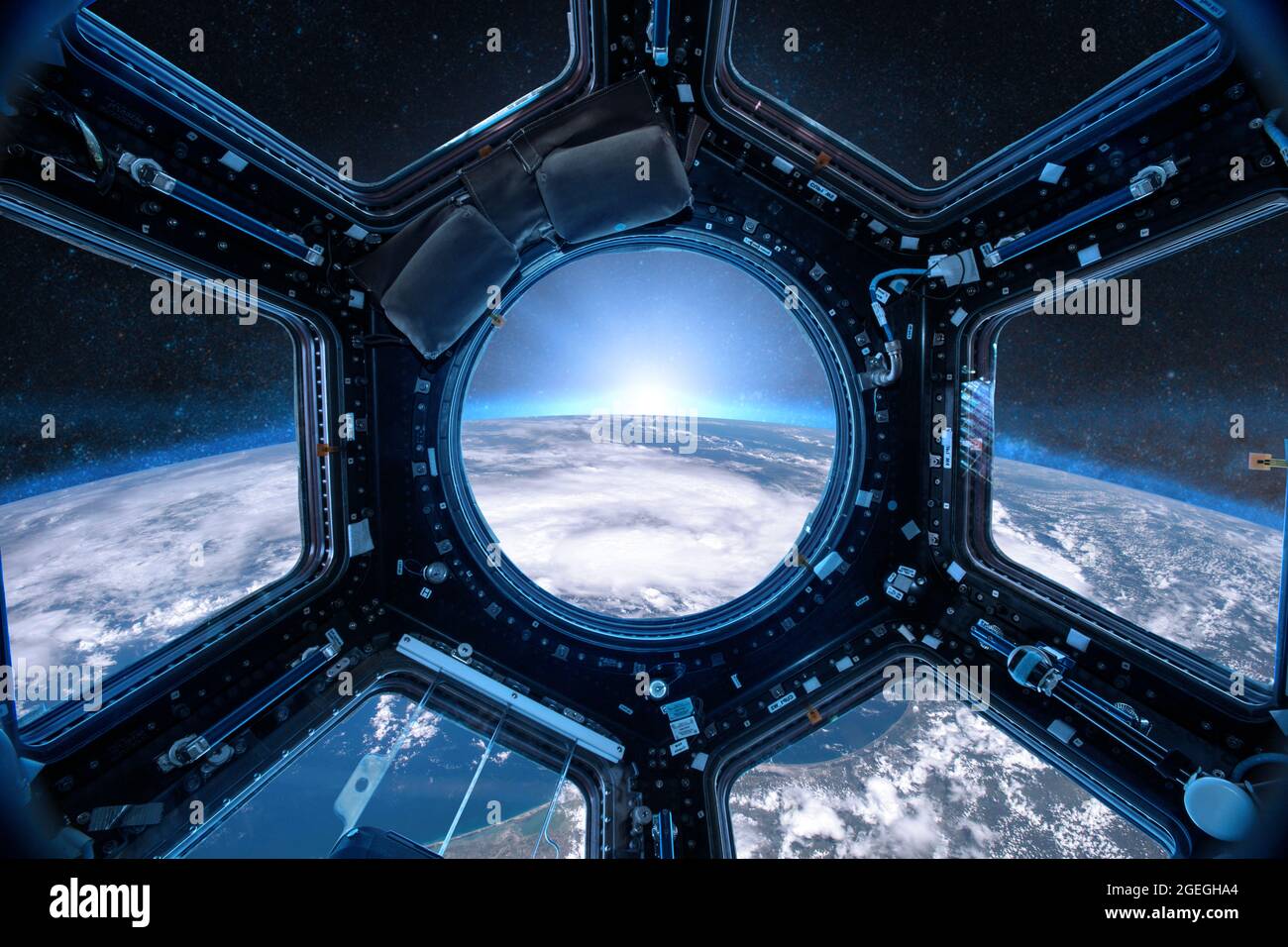 View from a porthole of space station on the Earth background. Elements ...