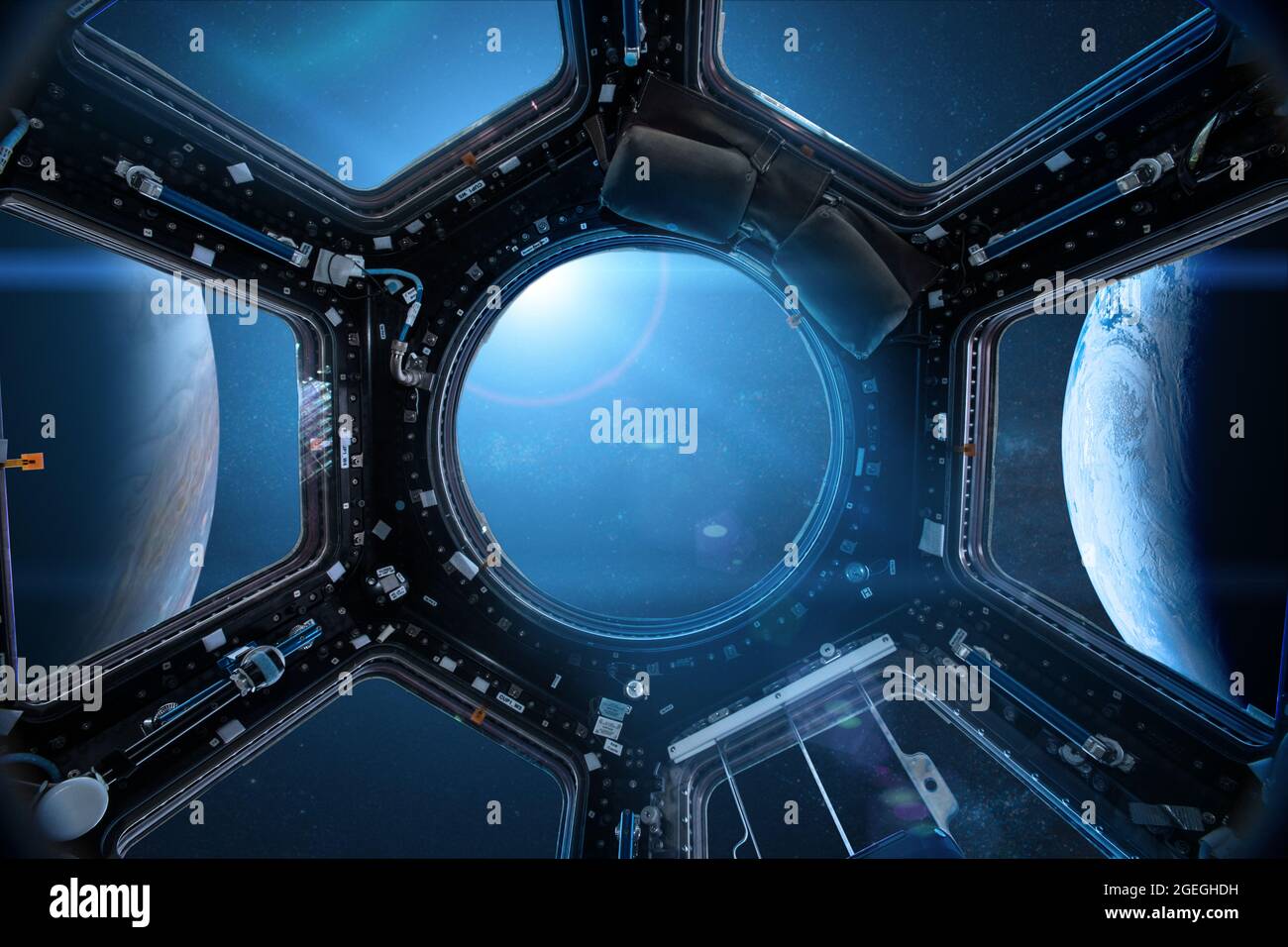 View from a porthole of space station on the Earth background. Elements ...