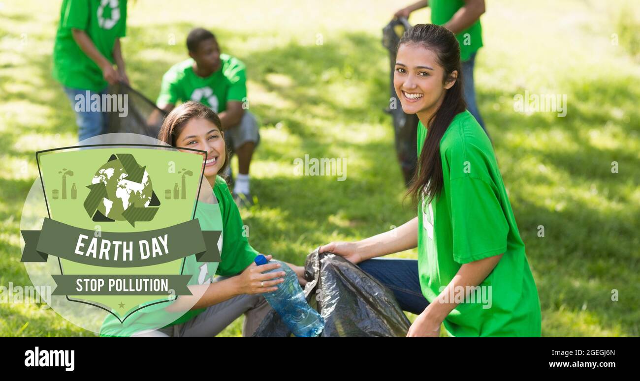 Composition of green globe logo and earth day text over smiling ...