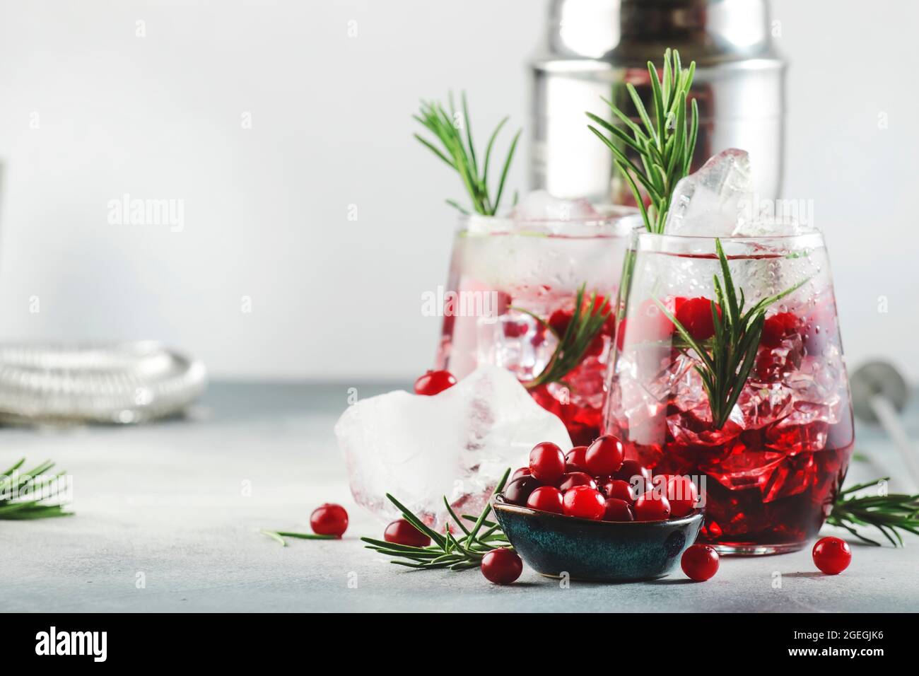 Winter Cranberry cocktail with vodka, ice, juice, rosemary and red ...