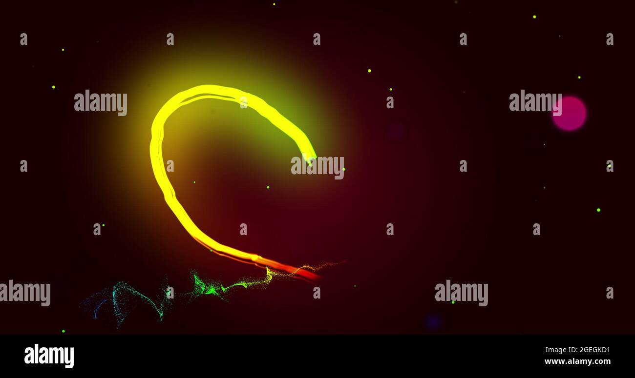 Image of glowing colourful light trail heart shape on black background ...