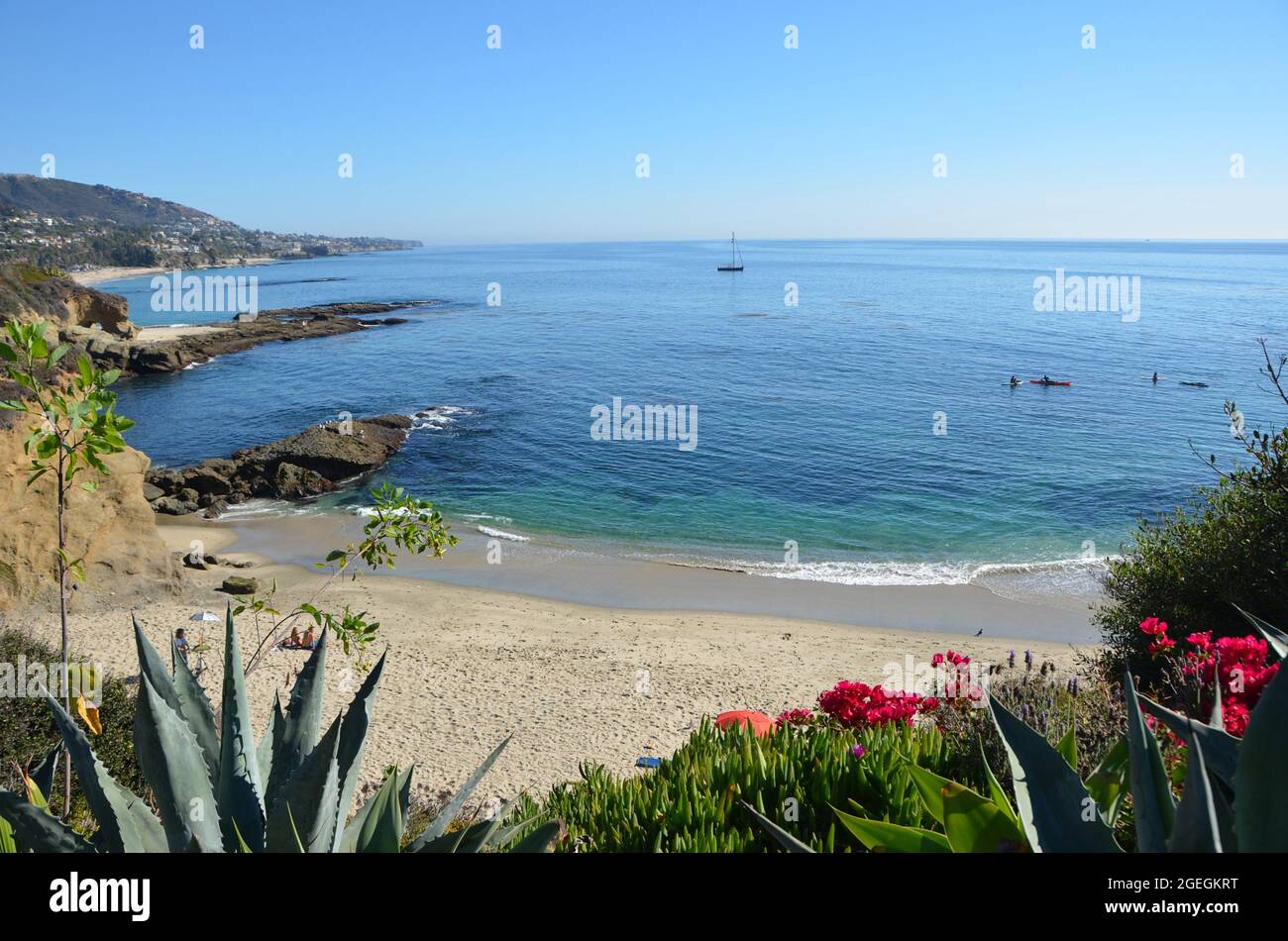 Scenic landscape with a sailing boat overlooking the Pacific Ocean in ...