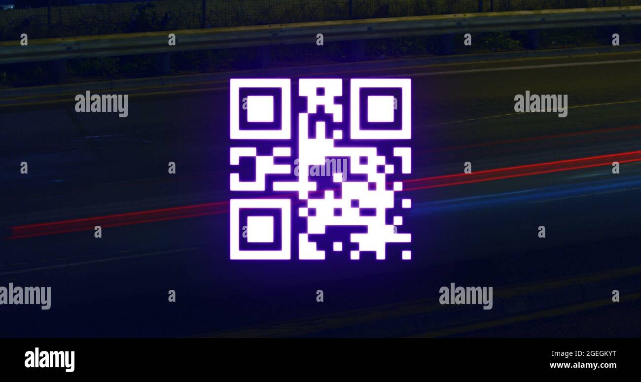 QR code scanner against light trails on black background Stock Photo ...