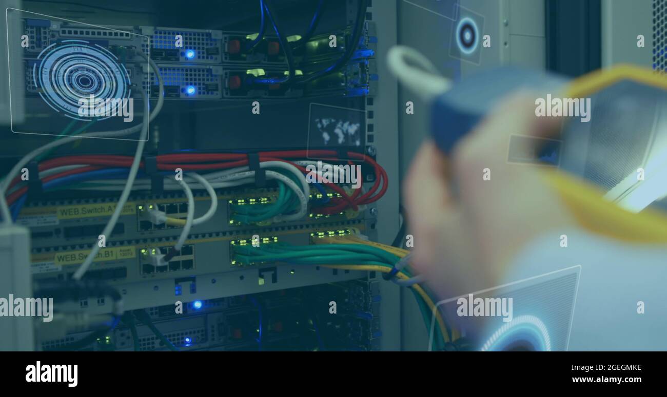Multiple round scanners against mid section of man working in computer ... Multiple round scanners against mid section of man working in computer ...