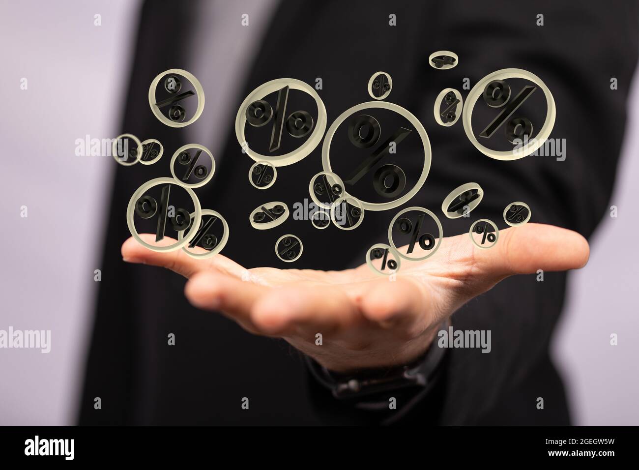 Male's hand holding illustrated red percent signs/symbols Stock Photo ...