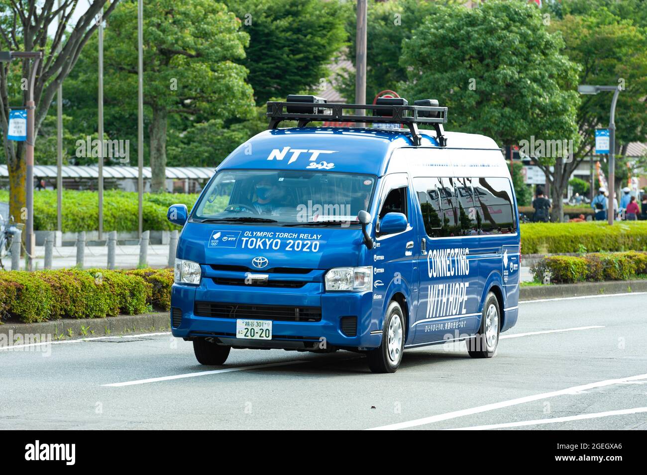 Tokyo 2020 Olympic Torch Relay. Car parade with partners and sponsors ...