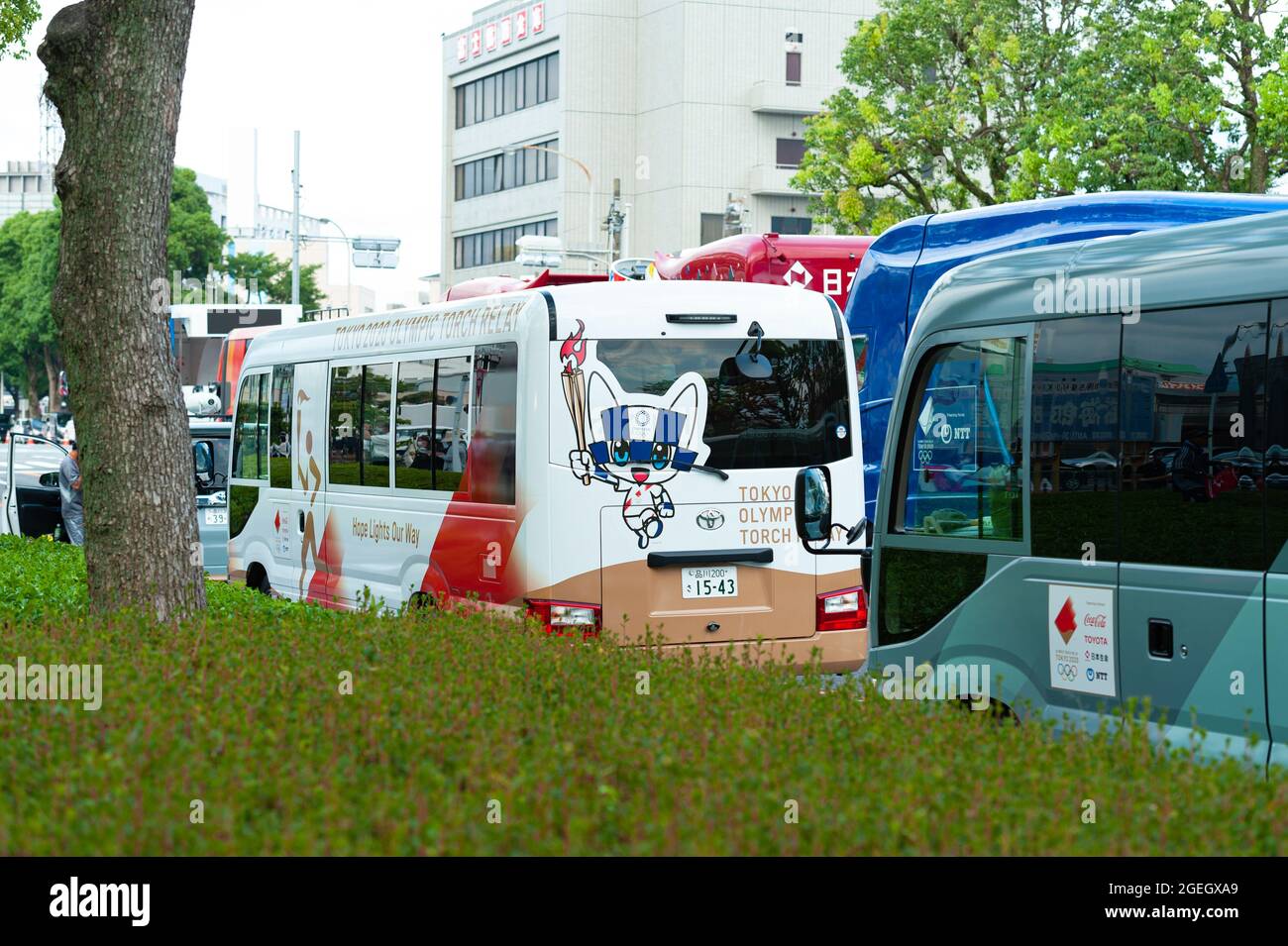 Tokyo 2020 Olympic Torch Relay. Car parade with partners and sponsors ...