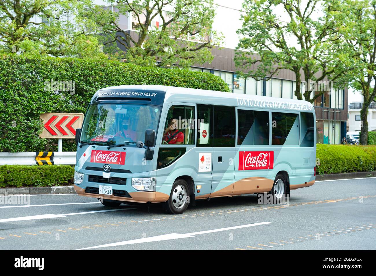 Tokyo 2020 Olympic Torch Relay. Car parade with partners and sponsors ...