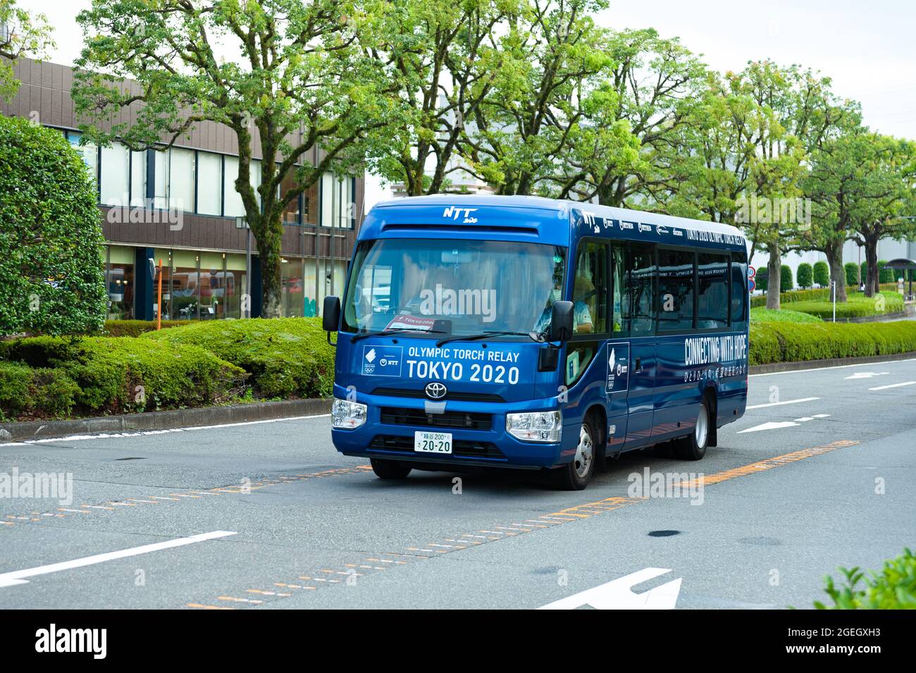 Tokyo 2020 Olympic Torch Relay. Car parade with partners and sponsors ...