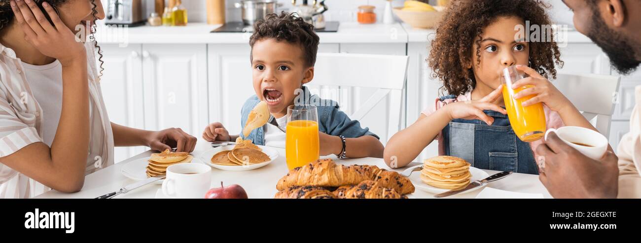 Black Child Eating Breakfast
